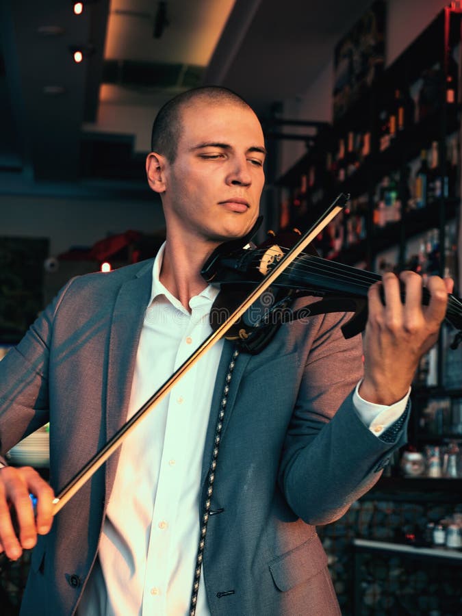 Violinist in Jacket Play Violin in Bar or Restaurant, Musical ...