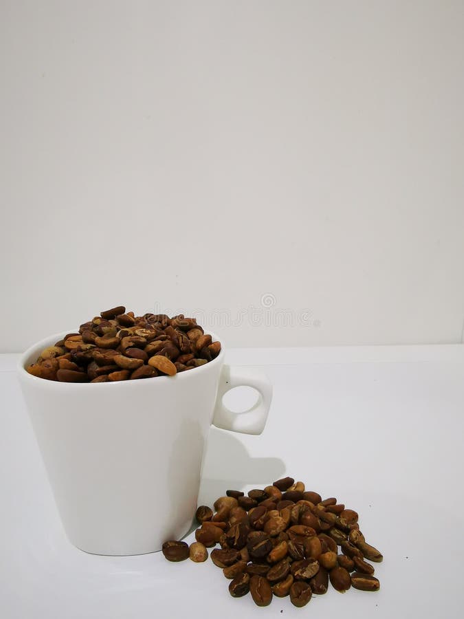 Virgin Coffee Beans Have a Beautiful View with a Cup Stock Photo ...