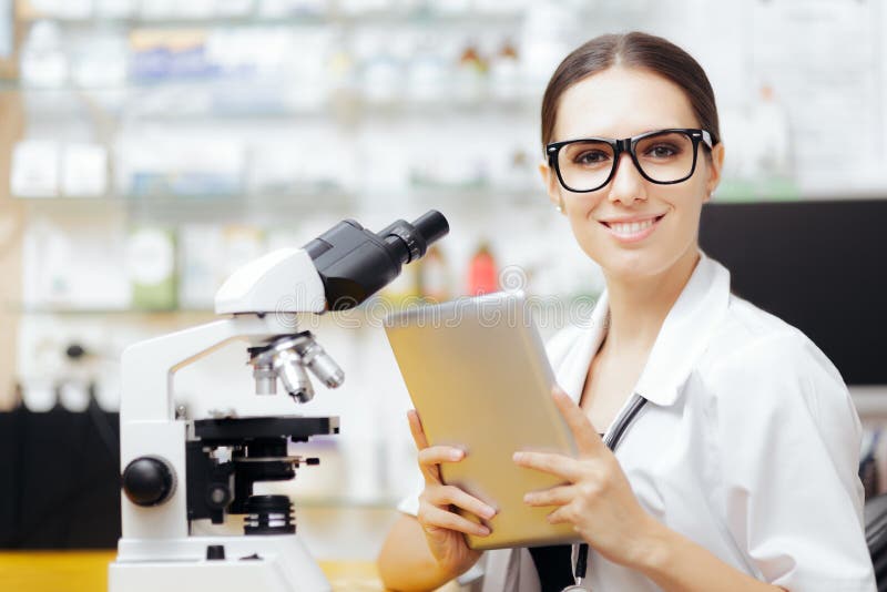 Scientist with Microscope and Pc Tablet Doing Research Study Stock ...