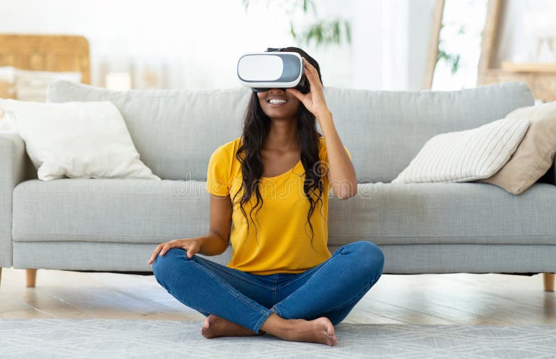 Virtual Entertainments. Black Woman in VR Headset Playing Interactive ...