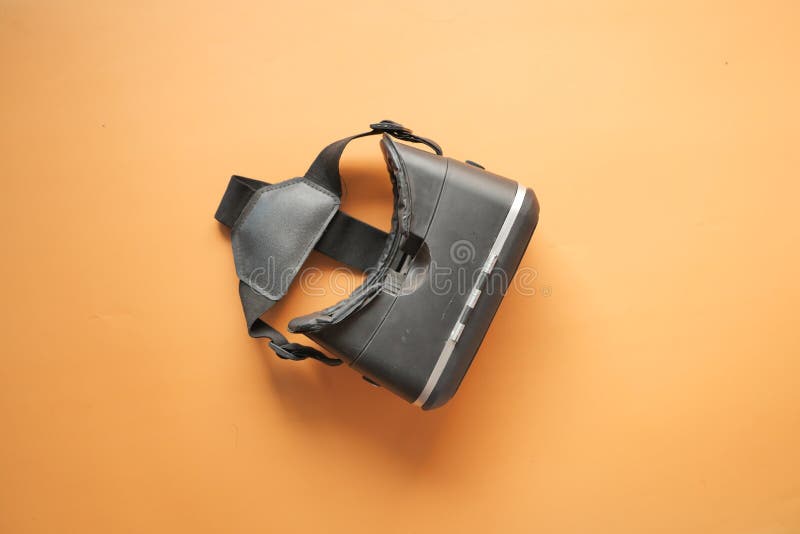 Virtual Reality Headset on Orange Table Stock Image - Image of visual ...