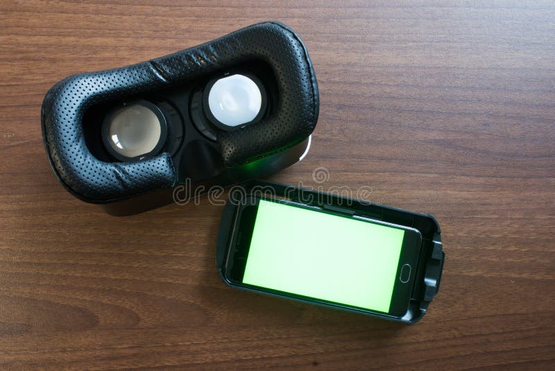 Virtual Reality, VR, Helmet and Smartphone with Green Screen for Stock ...