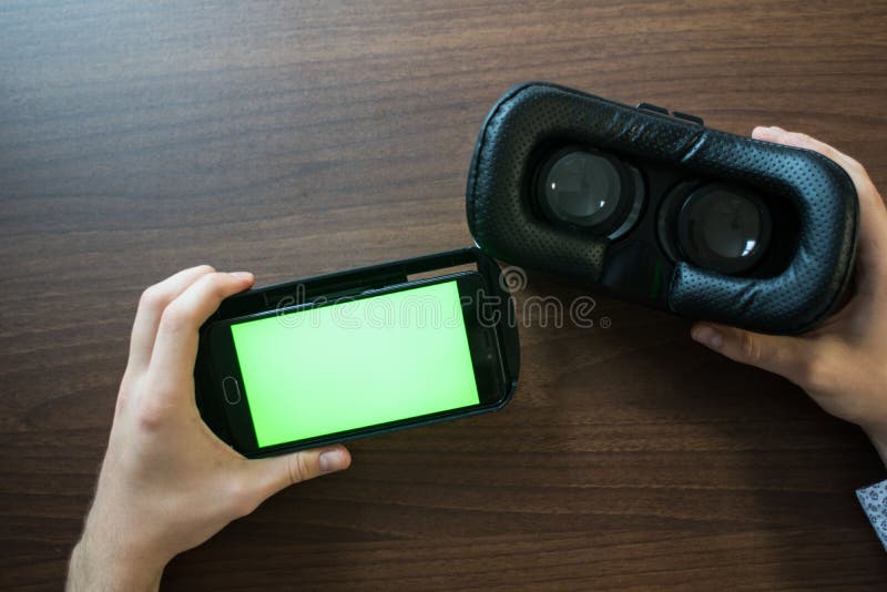 Virtual Reality, VR, Helmet and Smartphone with Green Screen for Key ...
