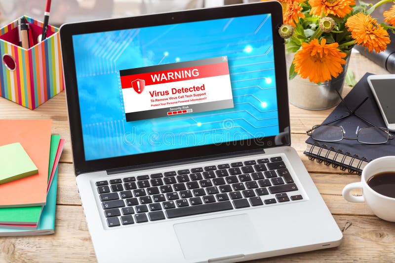 Virus Detected Warning on a Laptop Screen on an Office Desk Stock Image ... Virus Detected Warning on a Laptop Screen on an Office Desk Stock Image ...