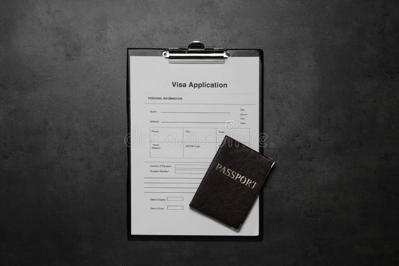 Visa Application Form for Immigration and Passport on Grey Table, Top ...
