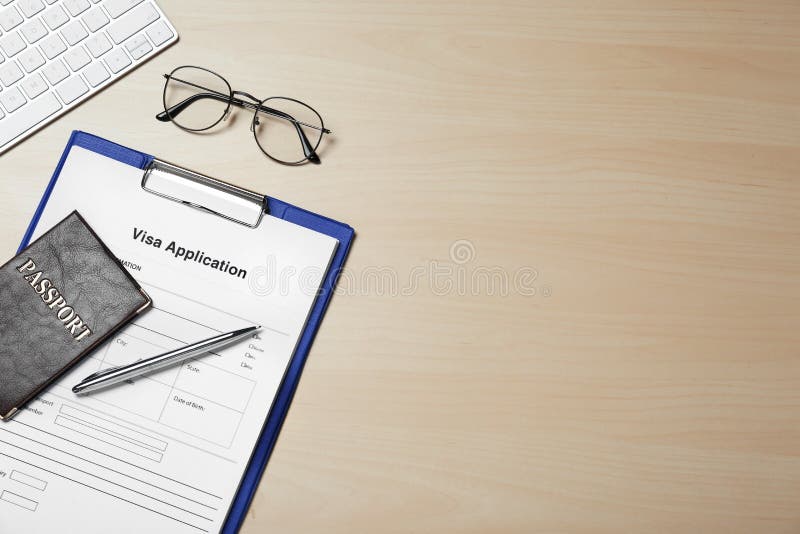 Visa Application Form Passport Glasses And Pen On Wooden Table Flat