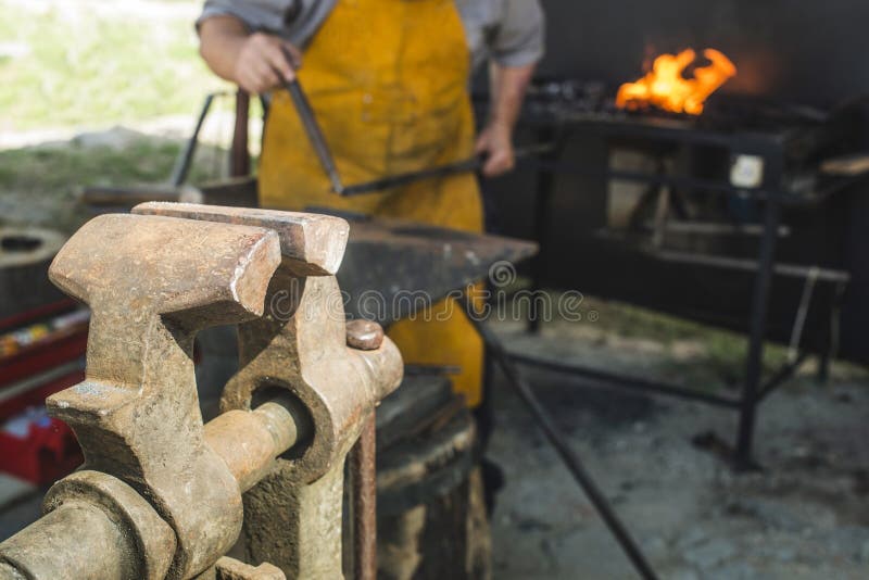 Vise and Anvil in a Forge Shop Stock Image - Image of tools, anvil ...