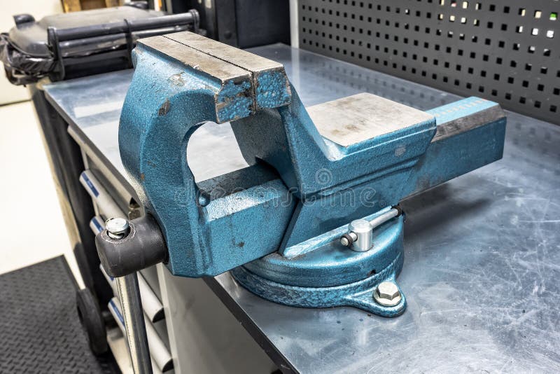 Vise on fitting the table stock photo. Image of clamp - 105408430