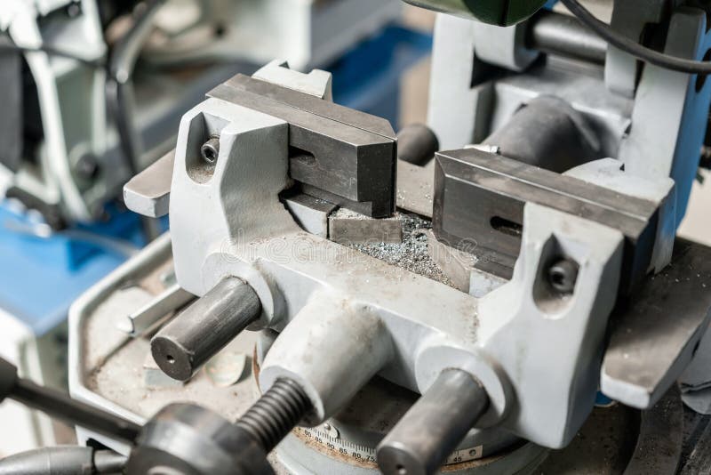 Vise To Secure the Workpiece. Circular Saw Machine. Cutting a Metal and ...