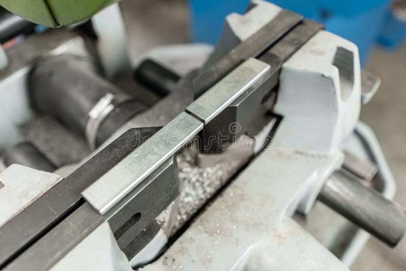 Vise To Secure the Workpiece. Circular Saw Machine. Cutting a Metal and ...