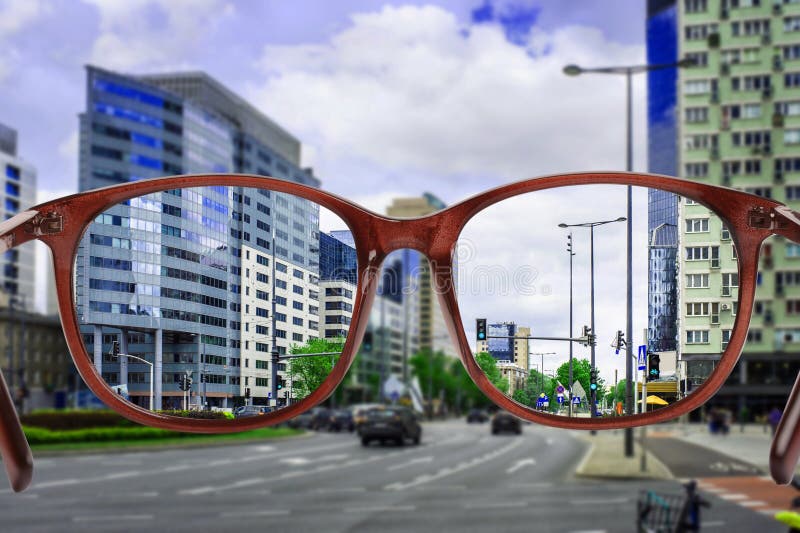 Vision Correction. Cityscape Becoming Clearer when Looking through ...