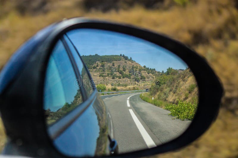 Vision Reflected in the Rearview Mirror of a Car Stock Photo - Image of ...