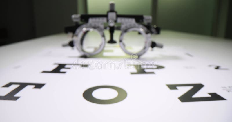 Vision Screening Device Next To Snellen Chart on Table Stock Footage ...