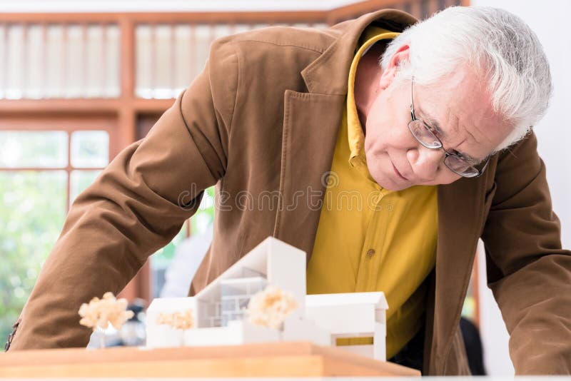 Senior Architect Working on the Project of a Modern Building Stock ...