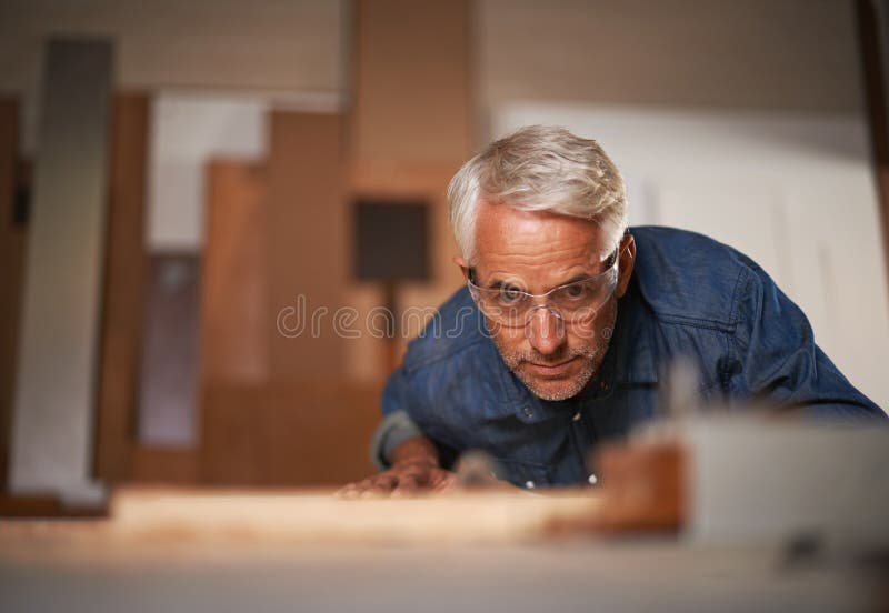 Visions of Success. a Senior Builder Working on a Project in His ...