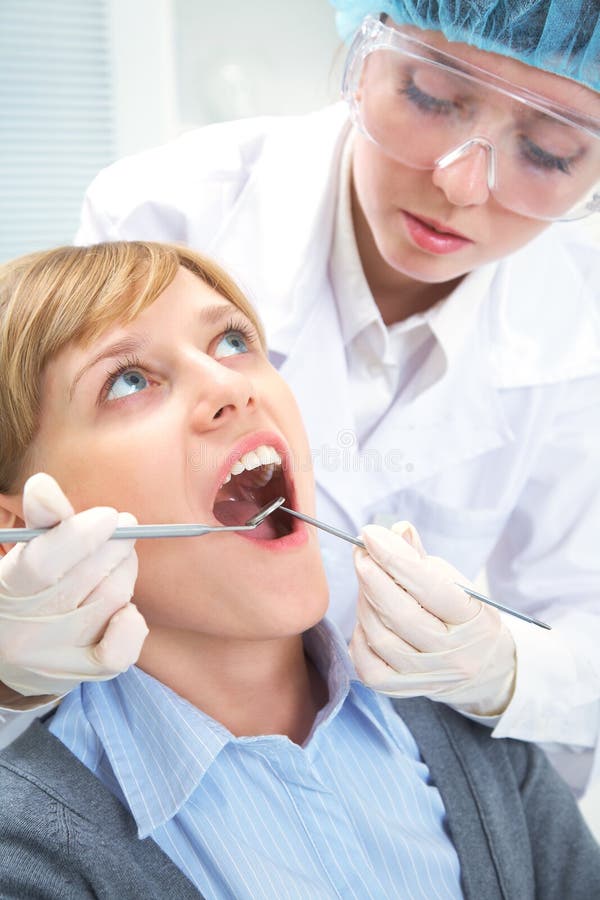 Working Dentist with Patient Stock Photo - Image of open, portrait ...