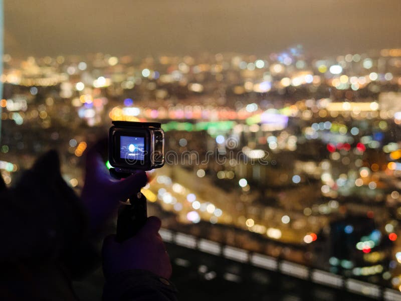 Visitor Films Night City on Mobile Camera Stock Photo - Image of ...