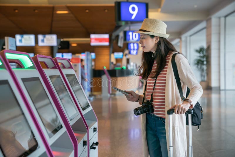 Visitor Standing at the Self-check-in Machine. Stock Photo - Image of ...