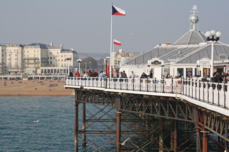 Visitors at the Pier in Brighton , UK Editorial Image - Image of ocean ...