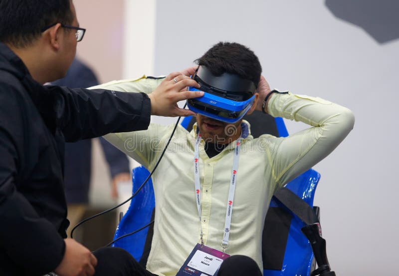 Man Testing VR Headset Baseball Experience at Vive Htc Booth in MWC ...
