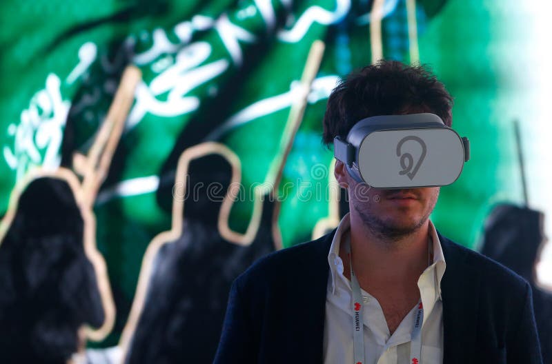 Visitors Testing VR Headset System at Mobile World Congress 2019 in ...