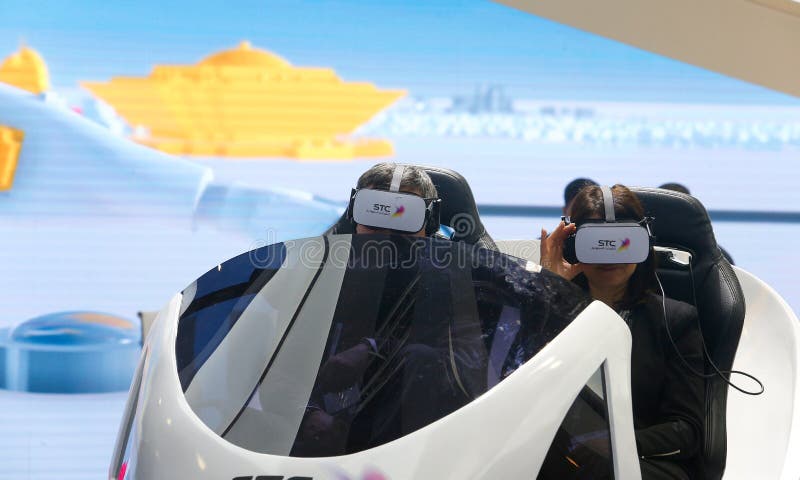 Visitors Testing VR Drone Experience at STC Booth in MWC 2019 Wide ...