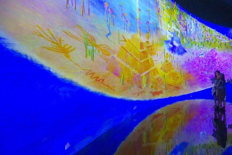 Visitors Walking Inside the ArtScience Museum Singapore while Looking ...