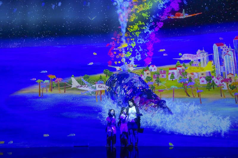 Visitors Walking Inside the ArtScience Museum Singapore while Looking ...