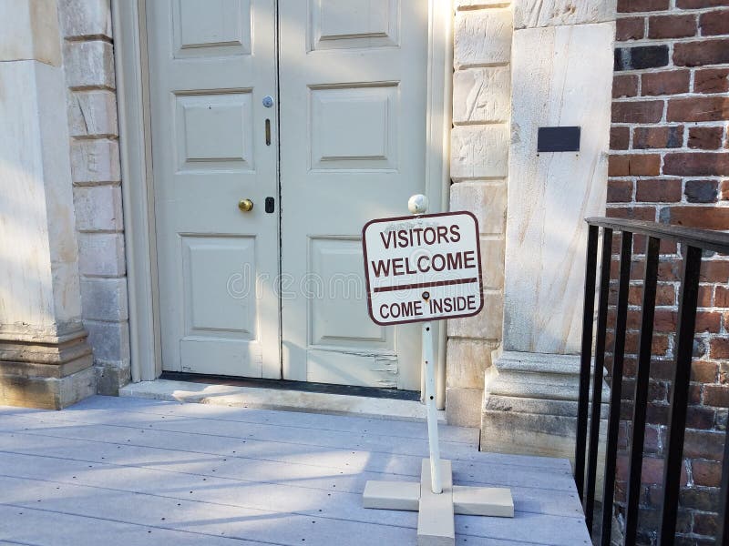 Visitors Welcome Come Inside Sign and White Door Stock Photo - Image of ...