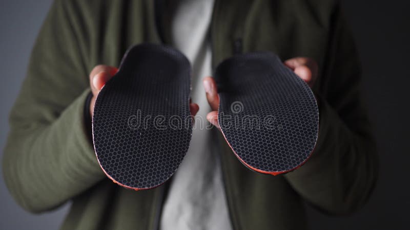 Visual Comparison of Two Shoe Insoles Showcasing Design and Texture ...