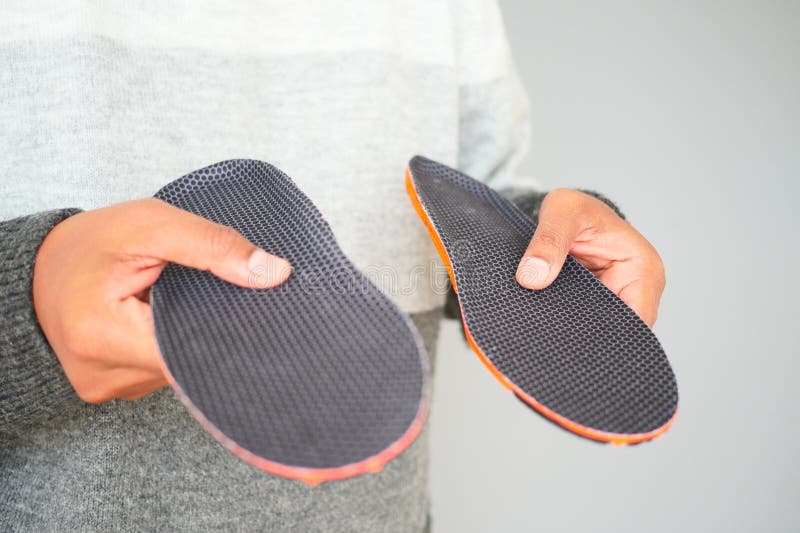 Visual Comparison of Two Shoe Insoles Showcasing Design and Texture ...