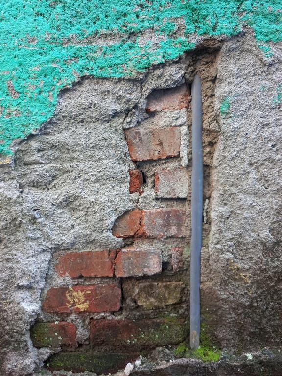 Visual Dynamics of Rough Plaster, Brick, and Integrated Pipes Stock ...