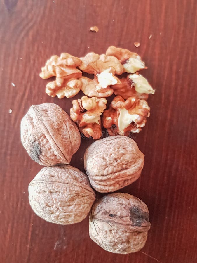 A Visual Journey through a View of Unshelled and Shelled Walnuts Stock ...