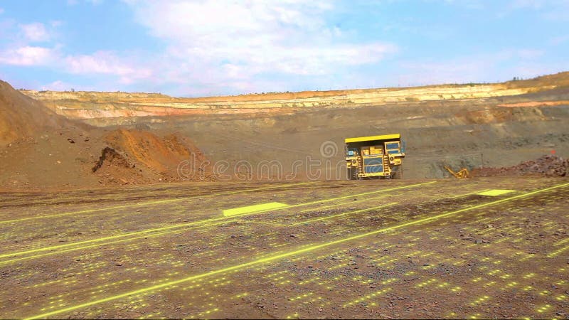 Quarry Truck Driving on the Road in Deep Quarry. a Large Mining Truck ...