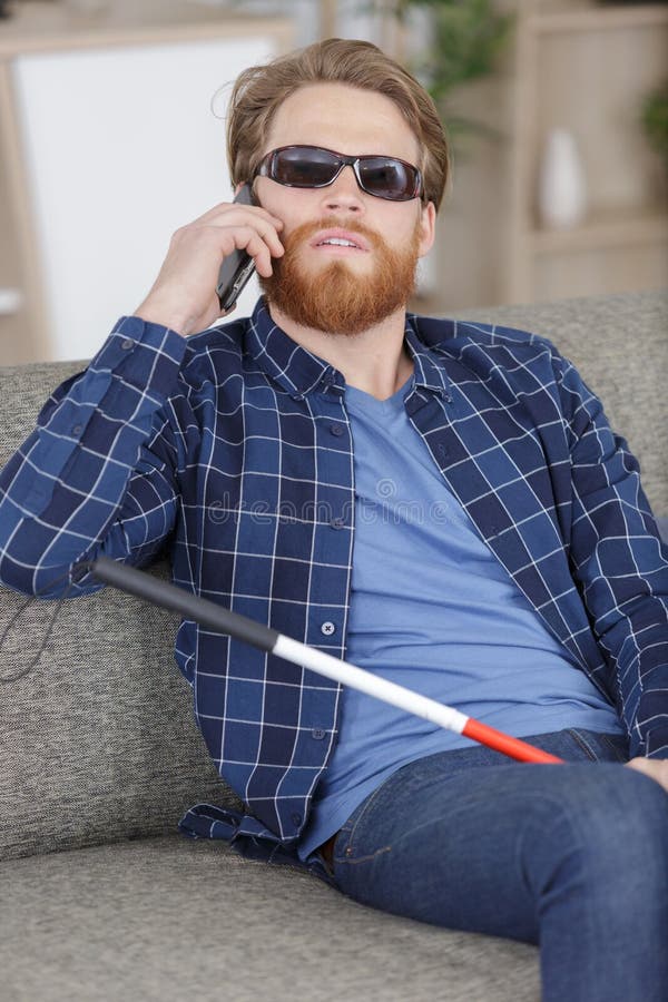 A Visually Impaired Man Uses a Scanning and Reading Machine. Stock ...
