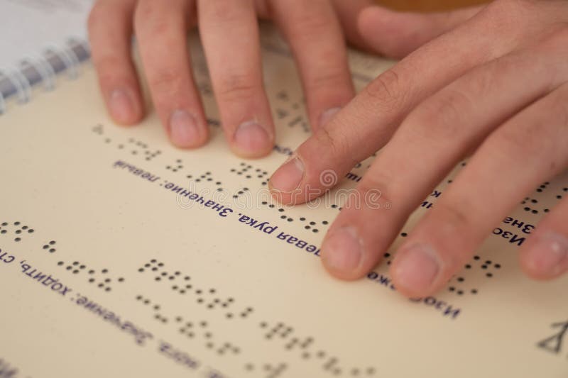 A Visually Impaired Man Uses a Scanning and Reading Machine. Stock ...