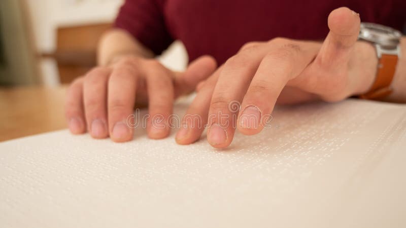A Visually Impaired Man Uses a Scanning and Reading Machine. Stock ...