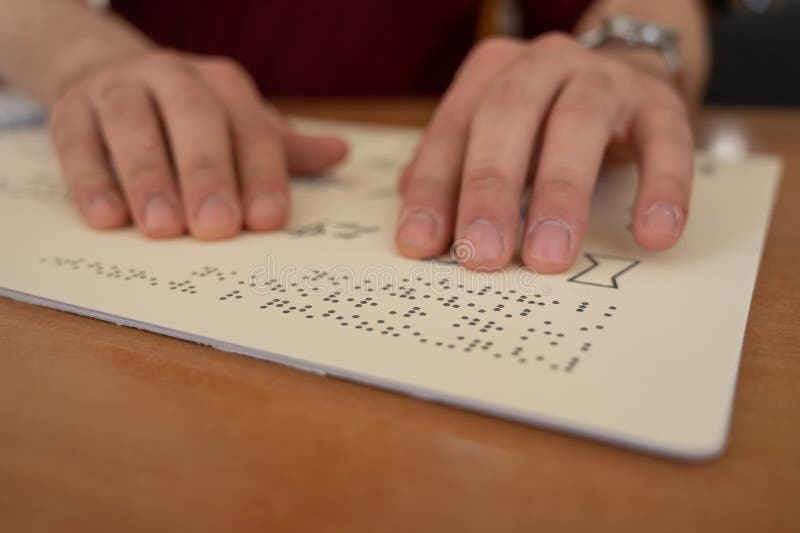 A Visually Impaired Man Uses a Scanning and Reading Machine. Stock ...