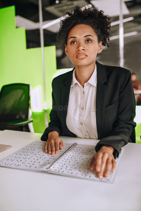 Visually Impaired Office Worker Seated at the Table Using Braille Stock ...