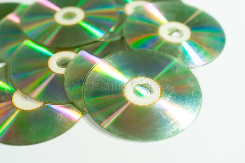 Visão Detalhada De Cds E Dvds Coloridos Imagem de Stock - Imagem de programas, azul: 259444073