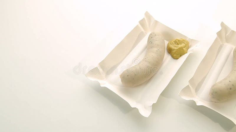 Vit korv och senap lager videofilmer. Video av lunch - 35380496