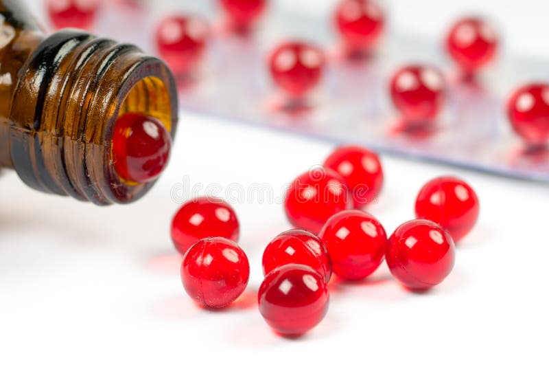 Vitamin E Capsules with Opened Bottle and Blister Pack Stock Photo ...