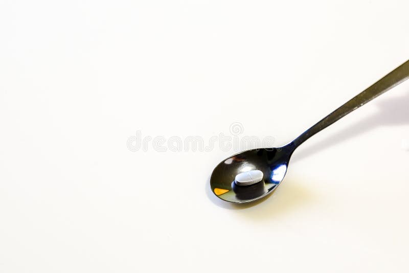 Vitamin Medicine on the Silver Spoon Stock Image - Image of white ...