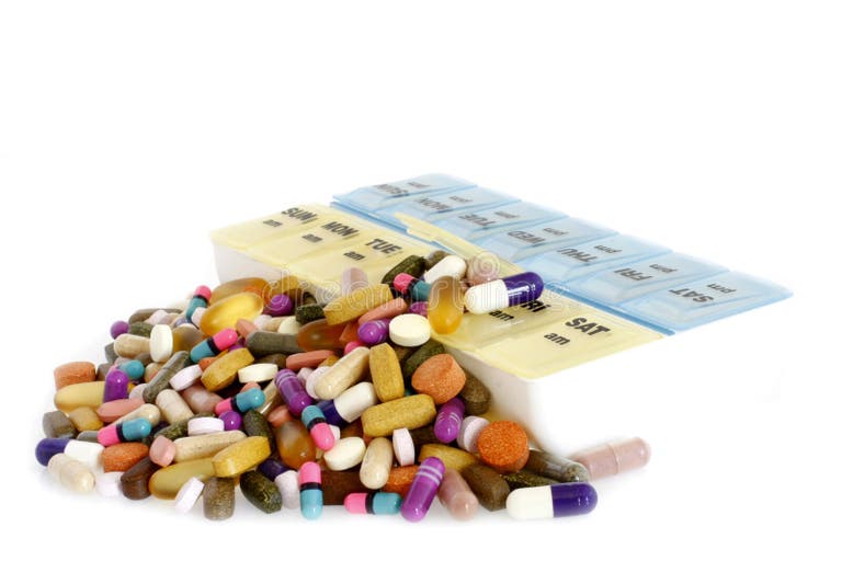 Vitamins, Drugs Overflowing a Pill Box Stock Photo - Image of seniors ...