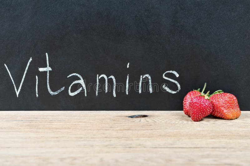 Vitamins in strawberries stock photo. Image of concept - 93370110