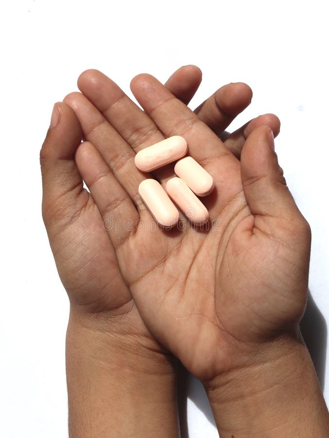 Vitamins and Supplements. Child S Hand with Medicinal Pills Stock Image ...
