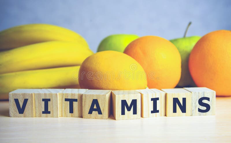 Vitamins Word on Wodden Cubes on Fruit Background, Detox Concept, Diet ...