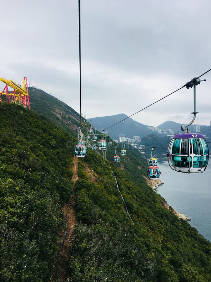 Cable car in theme park editorial stock photo. Image of filtered ...
