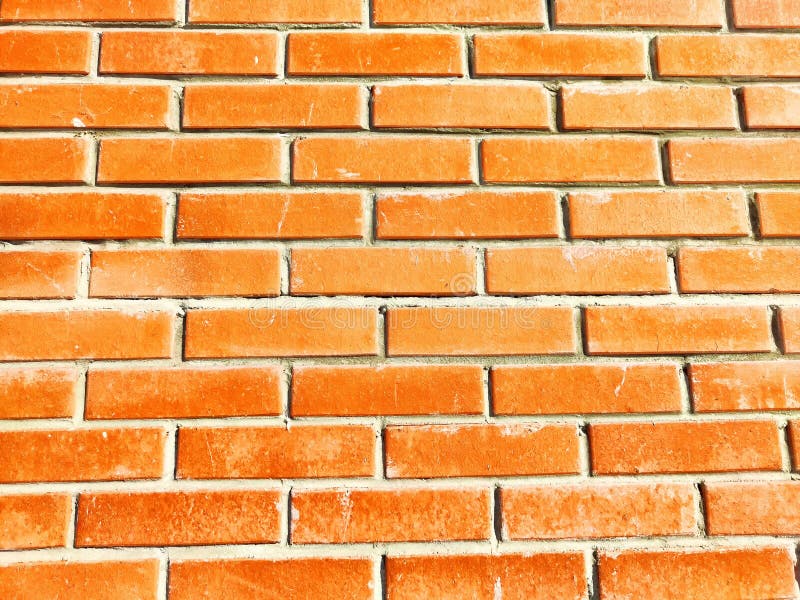 The Vivid Red Bricks Form a Strong, Textured Wall, Illuminated by ...