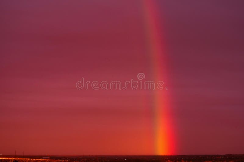 Vivid Red Sunset Sky with Striking Rainbow Column Stock Photo - Image ...